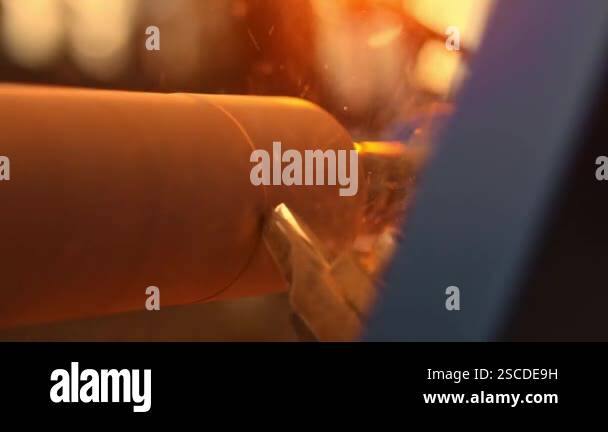 Slow motion. Close-up of carpenters hand, joiner works in workshop ...