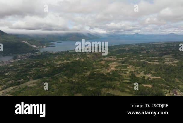 Aerial view of farmland on Samosir Island and Lake Toba. Sumatra ...