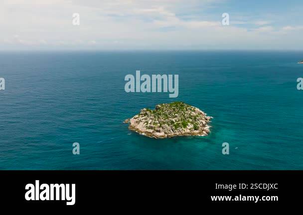 Rocky small island and blue ocean. Seychelles, Vache Island Stock Video ...