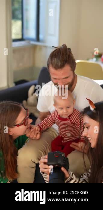 A heartwarming scene of family bonding as they explore photography ...