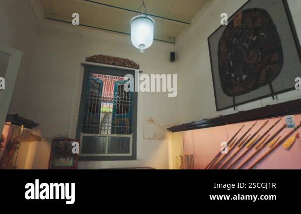 A historical room featuring a stained glass window, decorative wall art ...