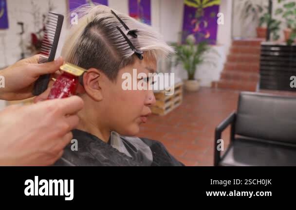 Hairdresser using hair setting Stock Videos & Footage - HD and 4K Video ...