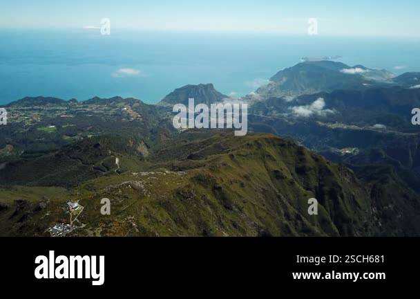 Aerial drone footage over mountains in Madeira Island, Portugal. Pico ...