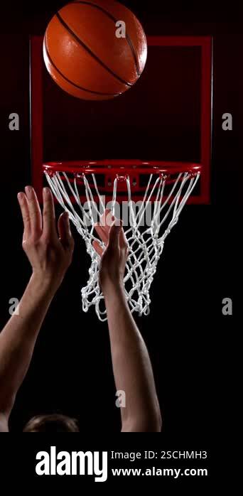 Super Slow Motion of Basketball Ball Hitting the Basket. Filmed on High ...