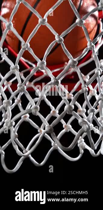 Super Slow Motion of Basketball Ball Hitting the Basket. Filmed on High ...