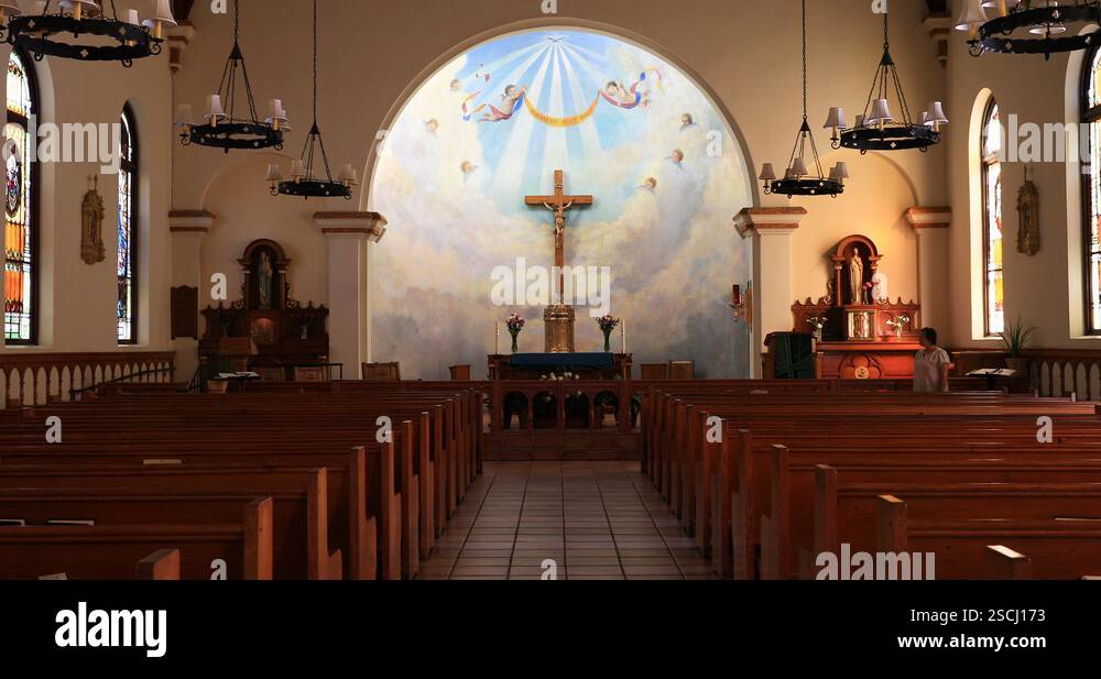 Old San Diego Church pews and altar cross woman 4K Stock Video Footage ...