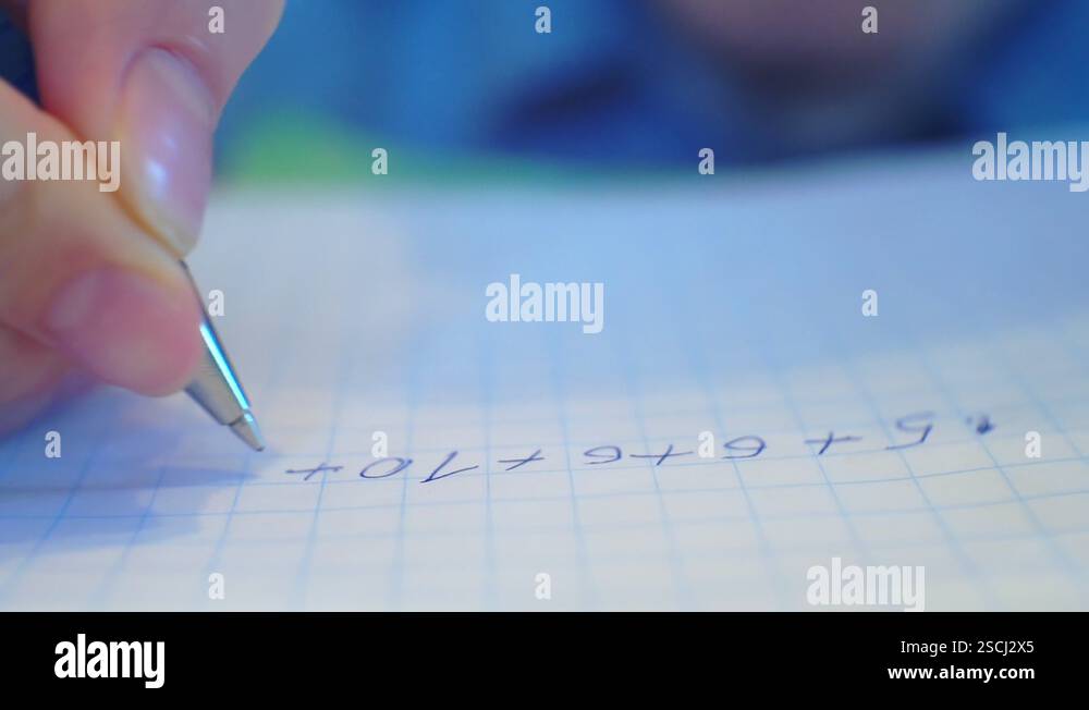 children's hands write numbers on a sheet of paper Stock Video Footage ...