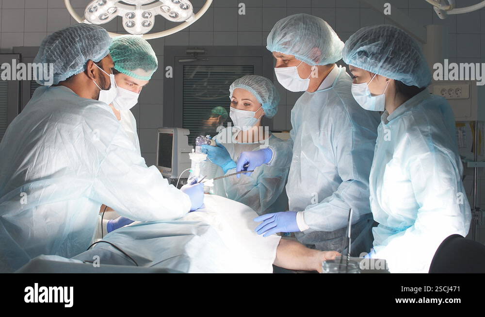 Team work of surgeons doing surgery to a patient under anesthesia in hospital Stock Video ...