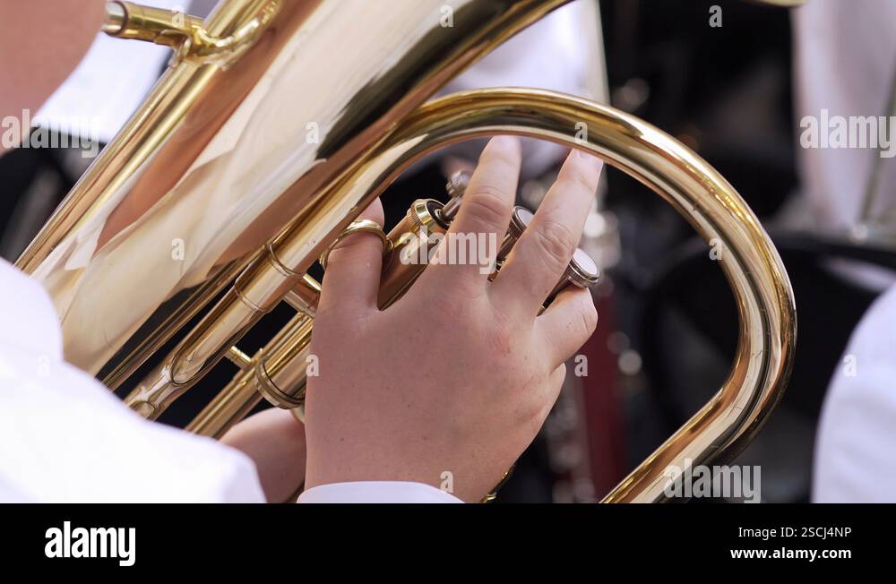 Hand holding trumpet on street concerte Stock Video Footage - Alamy