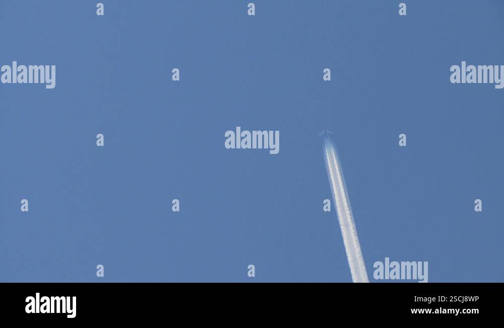 airplane contrail Stock Video Footage - Alamy
