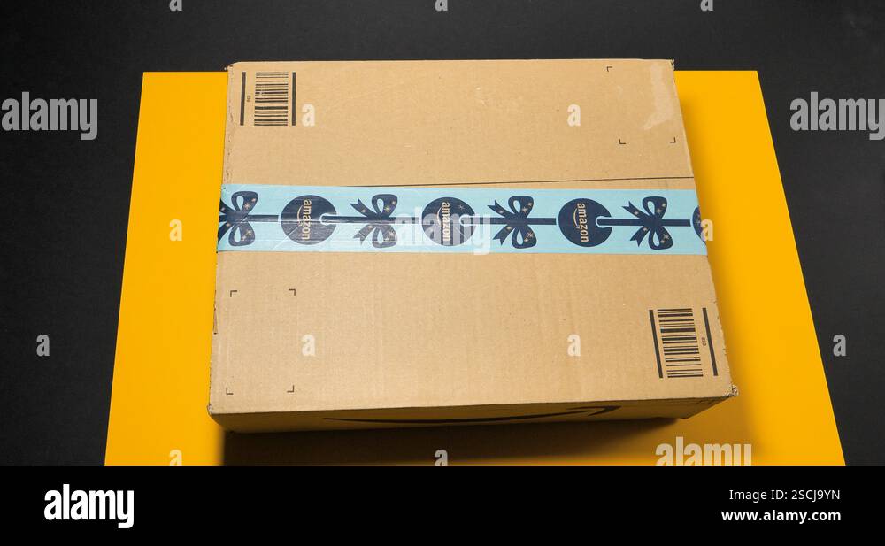 Man preparing to unboxing the new Amazon Cardboard box Stock Video ...