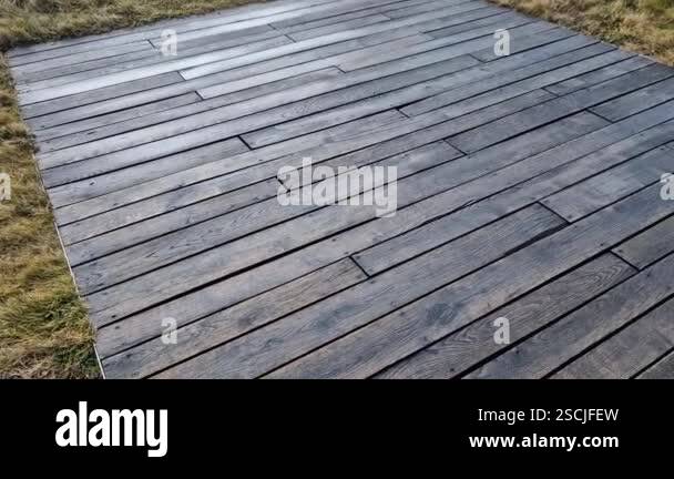 Impregnation of the terrace with oil paint. The color changes before ...