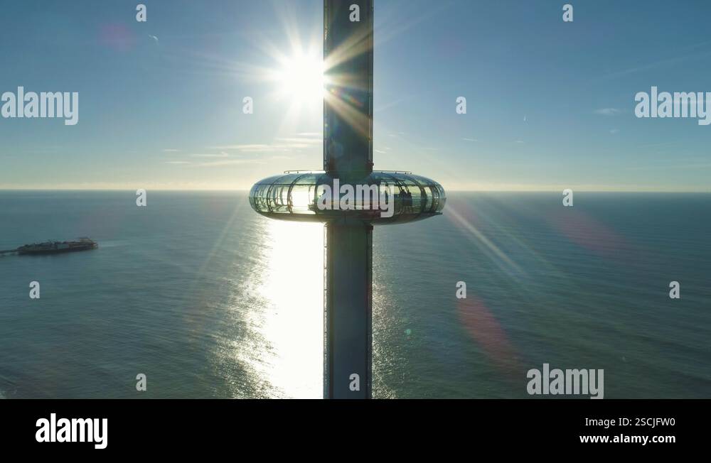 Sun blocked out by i360 viewing tower pan round view, drone aerial 4K ...