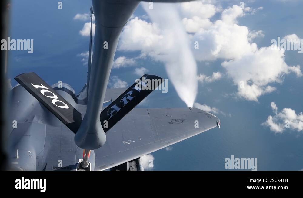 Condensation vapour releasing from F-15 Eagle wing tips during aerial ...