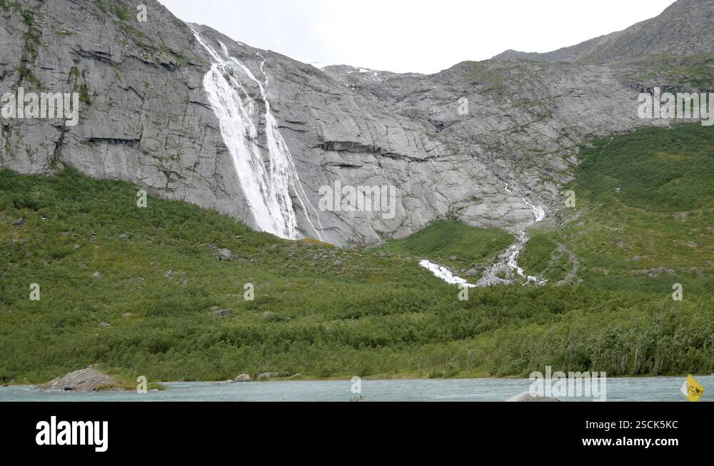 With The High Cliffs Of The Norwegian Fjords Falls Waterfall Stock ...