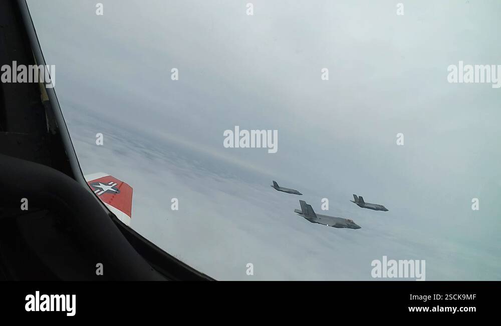 View from cockpit of three F-35C Lightning II's flying in formation ...