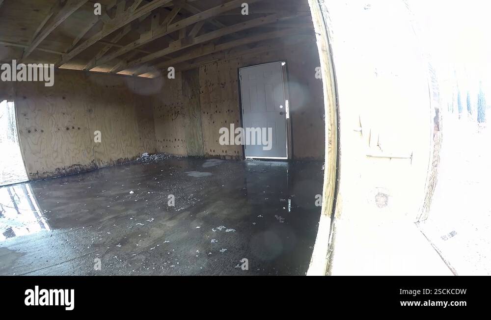 View from inside a building during army training with explosions Stock ...