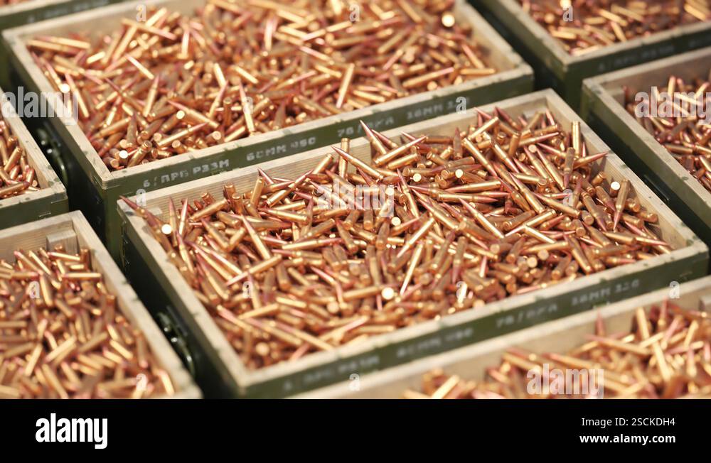 Huge stack of military boxes filled with rifle and machine gun ...