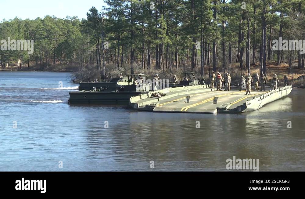 Troops installing military floating bridge at river Stock Video Footage ...