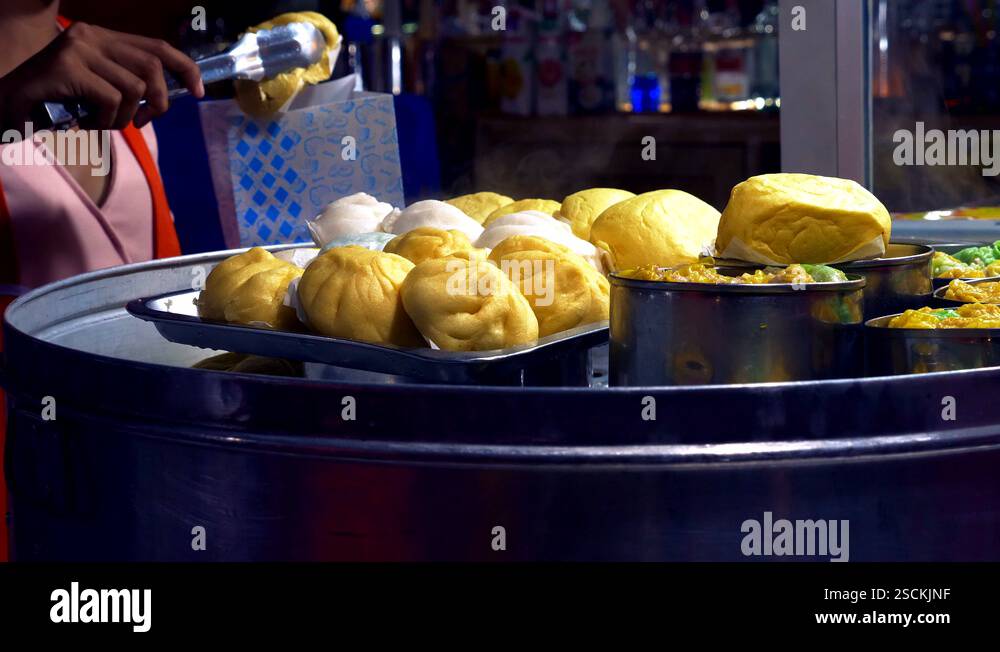 Traditional street food of Thailand. Cooking national dishes at night ...