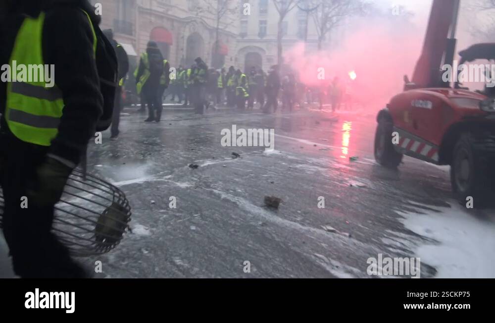Rioters pulling and carrying metal debris to make sound and disrupt ...
