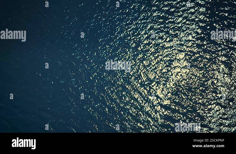 Aerial topshot view following of the boat cruising with young people in ...