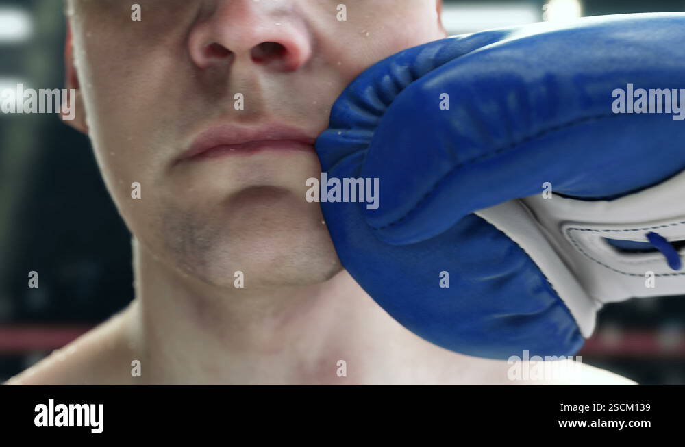 Boxer great punch, boxer punching hook to the jaw, in super slow motion ...