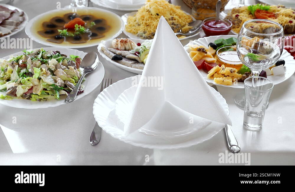 Fully decorated table with refined dishes. Ready to start celebrations ...