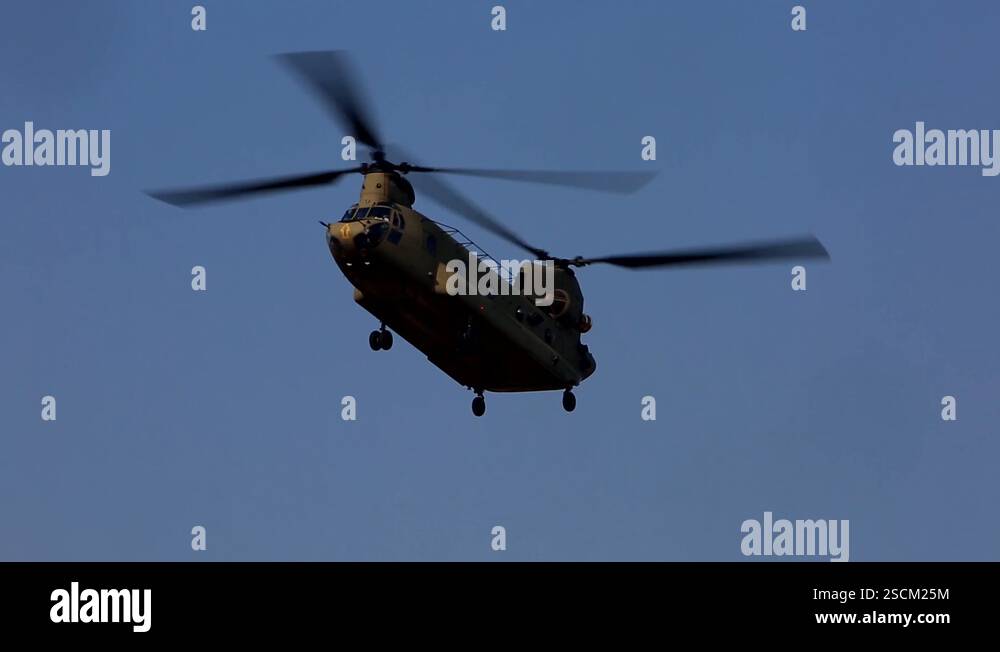 Chinook helicopter landing in an open field Stock Video Footage - Alamy