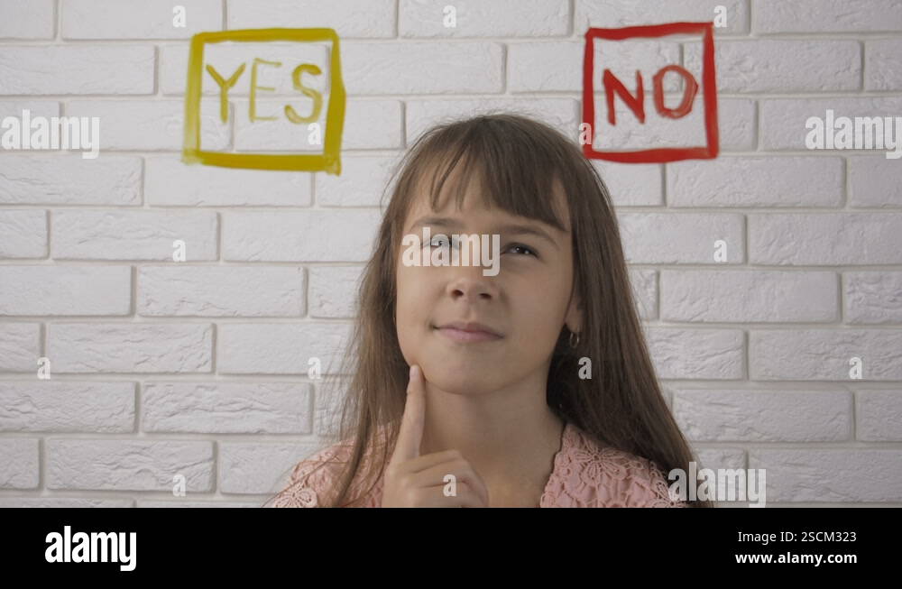 The child chooses a yes or no button Stock Video Footage - Alamy