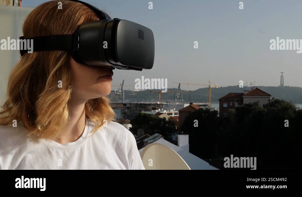 Young Woman In Augmented Reality Handheld Shot Stock Video Footage - Alamy