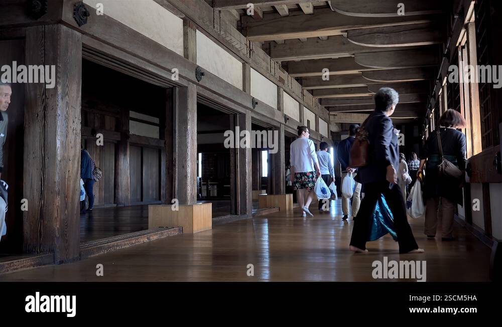 Tourists on the upper floor of the Himeji White Heron Castle main ...