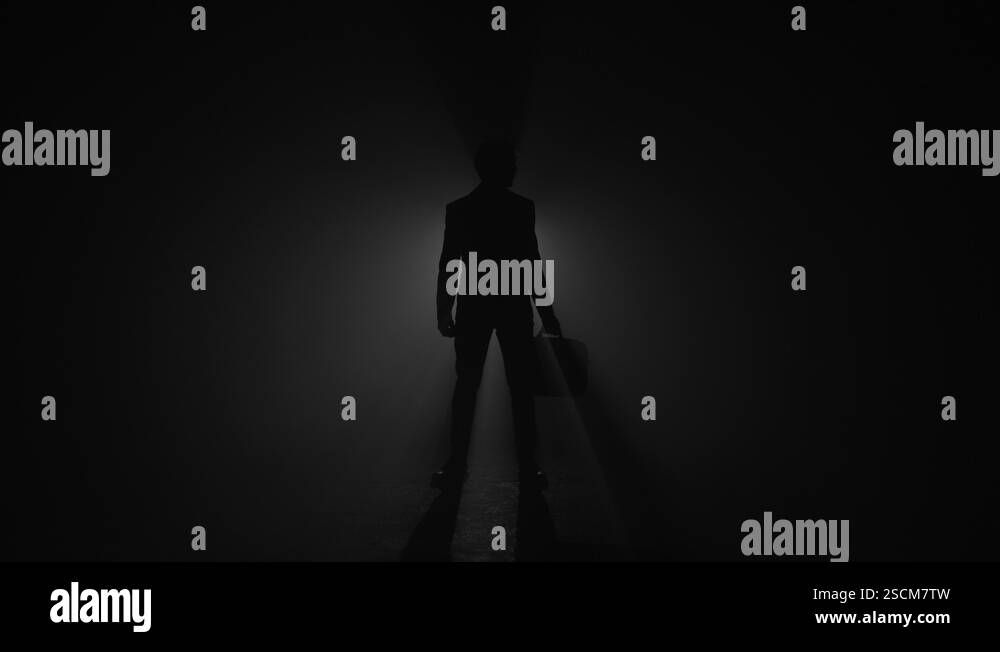 Silhouette of corrupted businessman exchanging briefcase with handshake ...