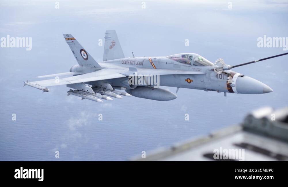 F/A-18 Hornet conducts aerial refuel with probe and drogue Stock Video ...
