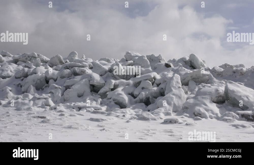Ice surge caused by high strong winds and fast moving waters Stock ...