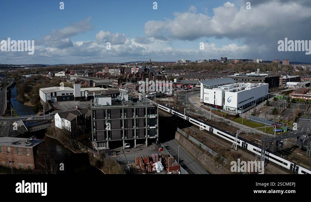 Footage of trains approaching and leaving Stoke on Trent train station ...