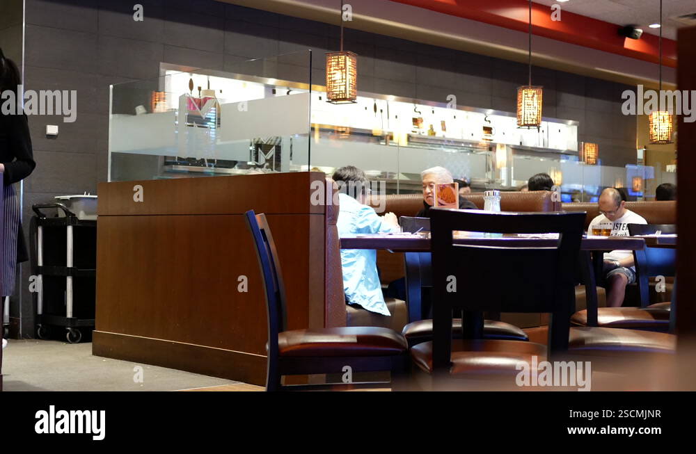 Motion of people enjoy meal inside Chinese restaurant with 4k ...