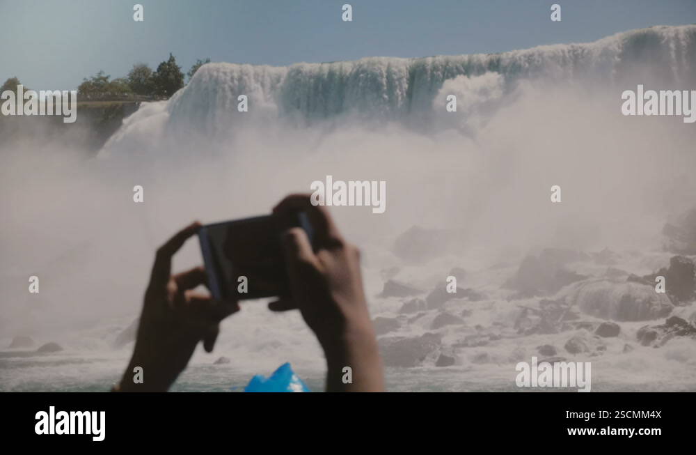 Slow motion close-up human hands taking smartphone photos of epic ...