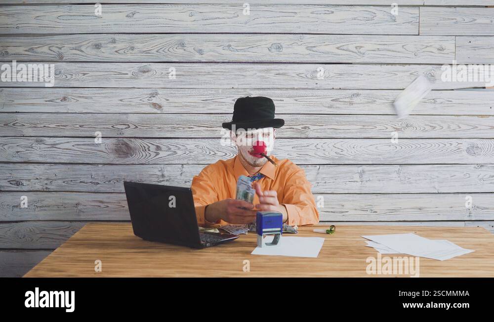 clown boss counting dollar billes money and smoking cigar. Concept on ...
