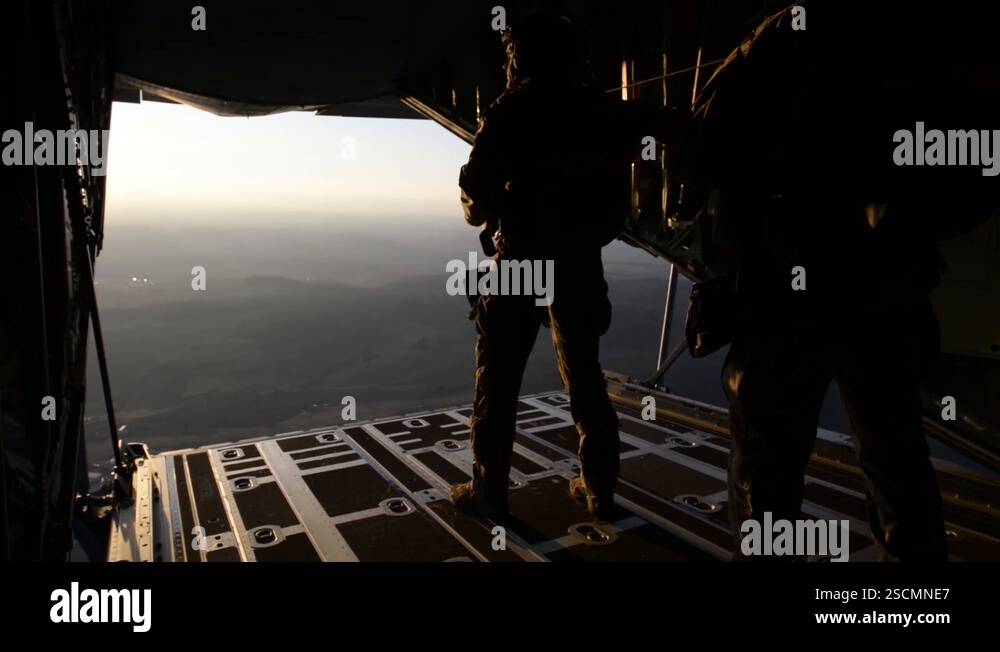 Soldiers perform static line jump from C-130 Hercules Stock Video ...