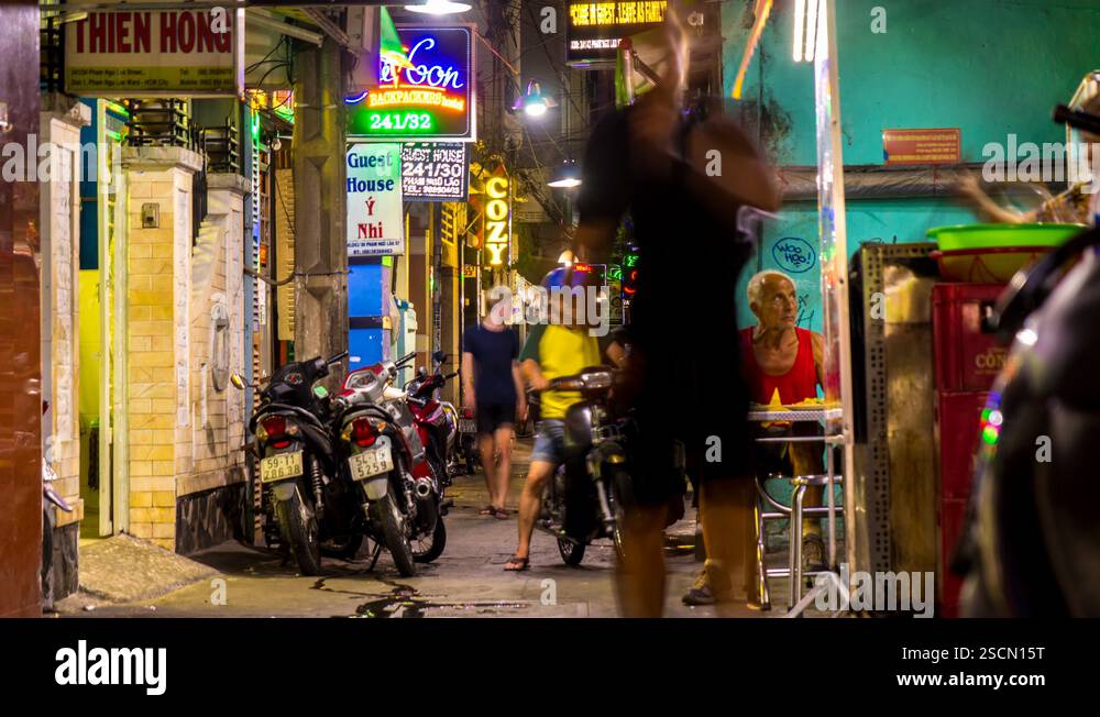 Nightly street scene of a side street in Ho Chi Minh City Stock Video ...