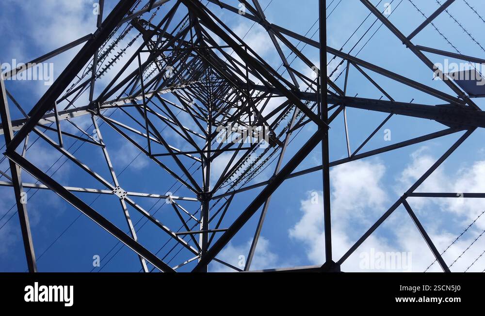 A grid pylon tower carrying an overhead electricity power line Stock ...