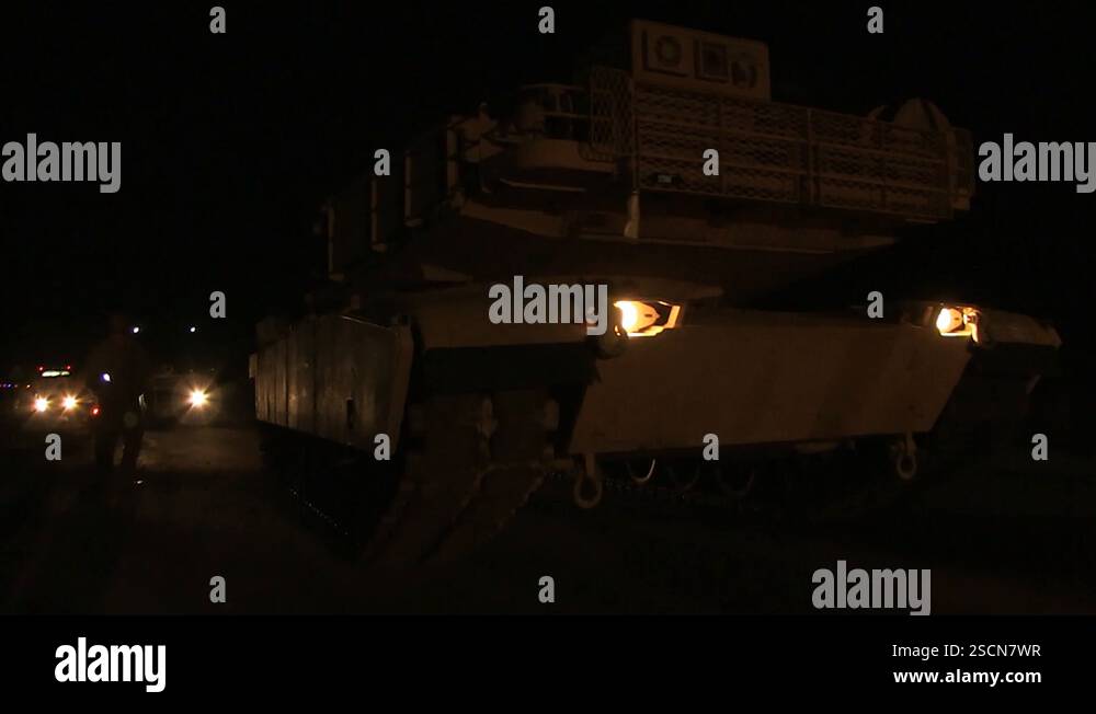 M1 Abrams tank stopping in the desert at night Stock Video Footage - Alamy