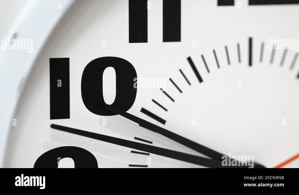 The Time On The Clock Ten. Clock With The Red Arrow Running Stock Video ...