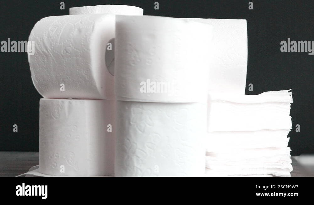 Rotating stack of paper rolls, paper tissue, napkins. White hygienic ...
