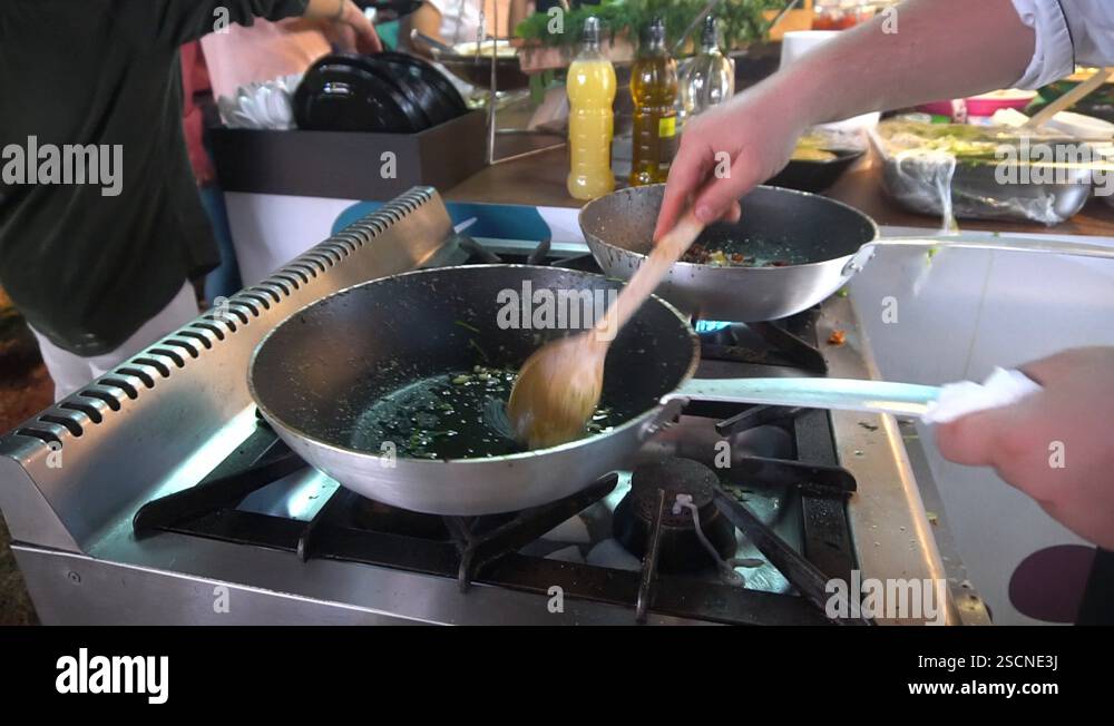 Cooking And Mixing Seafood In The Pan Stock Video Footage - Alamy