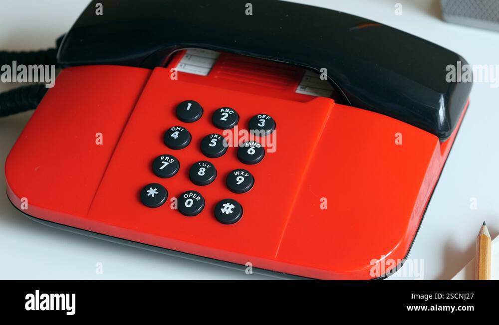 Dialing A Number On A Red Push-button Phone Stock Video Footage - Alamy