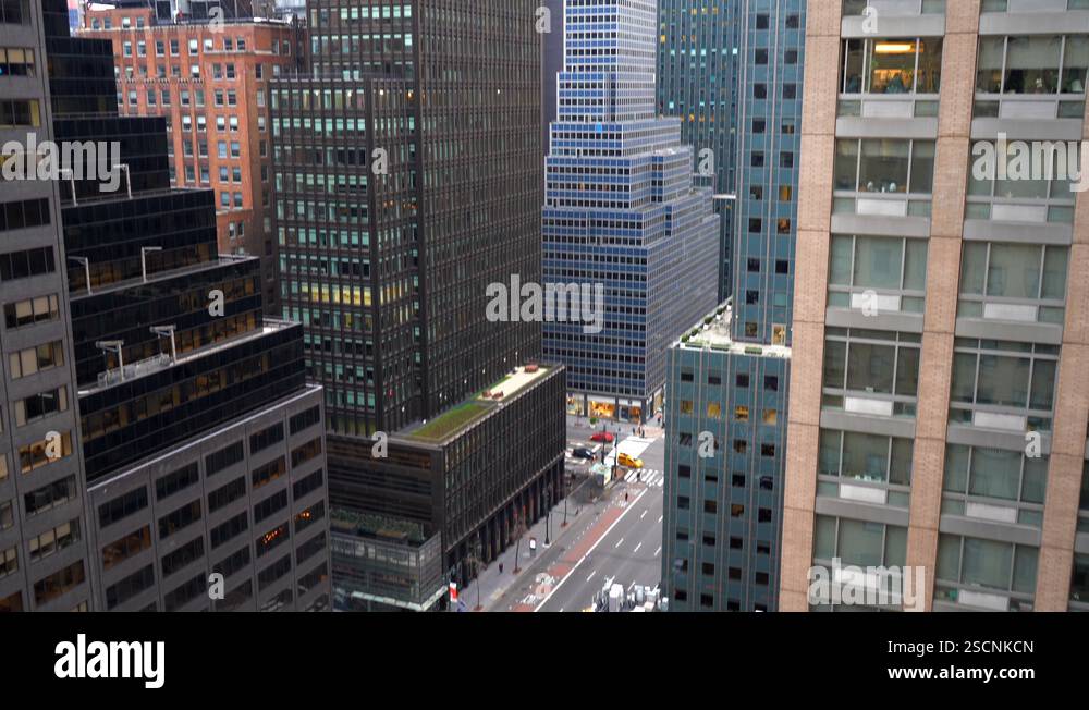 Day Time Tilt Up View of Skyscraper Buildings from the 19th Floor in N ...