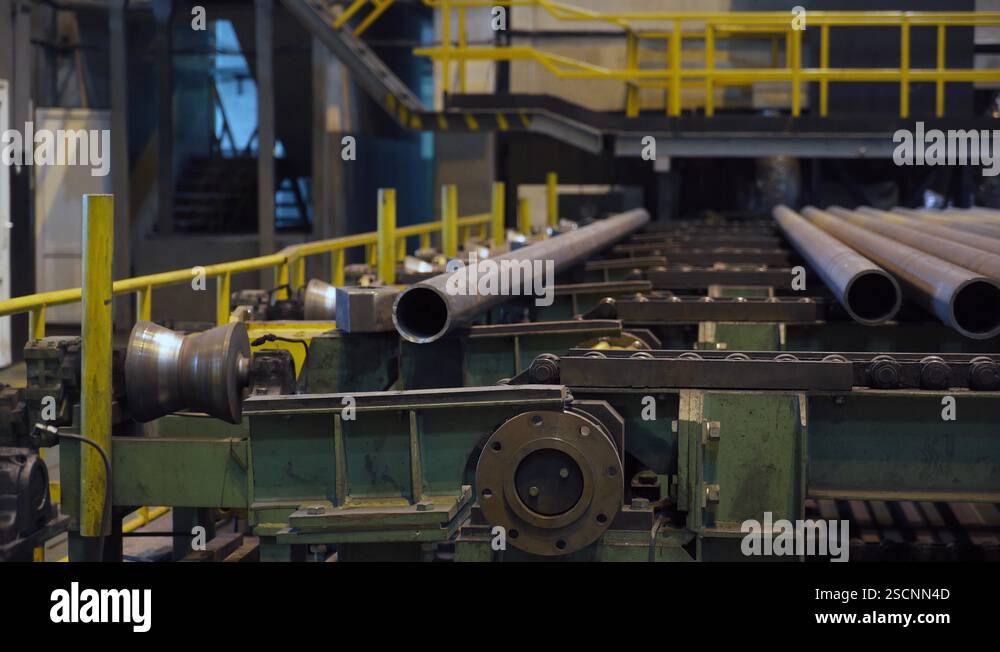 Steel mill, steel pipes production, ready pipes transported on ...