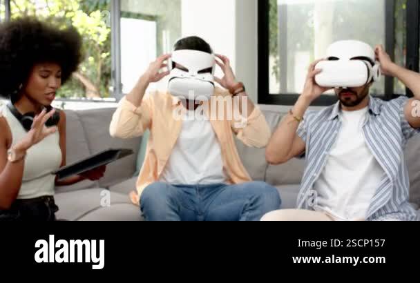 Using VR headsets, diverse friends experiencing virtual reality ...